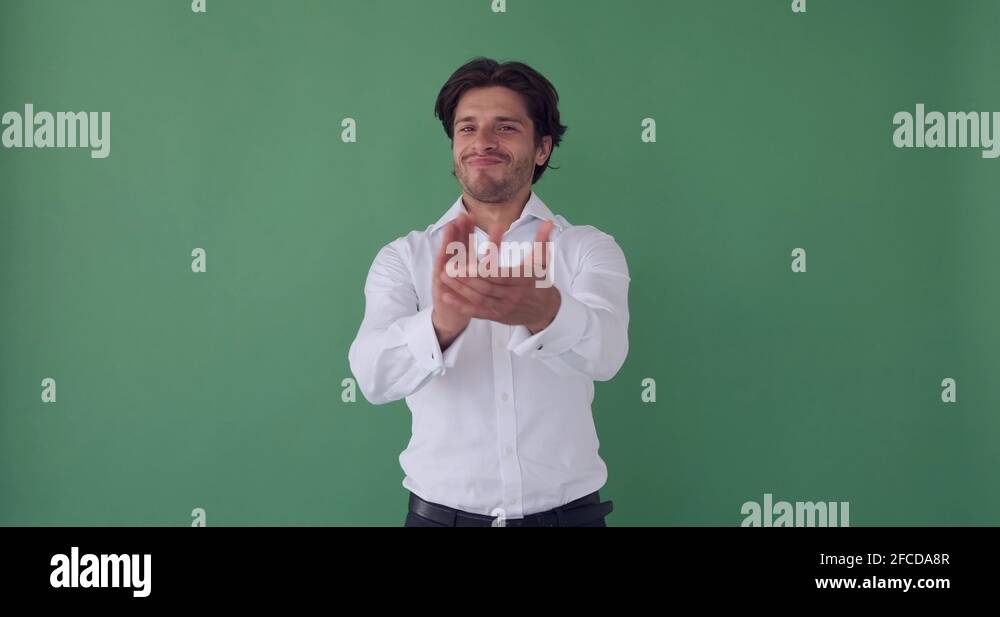 Excited businessman cheering and clapping over green screen Stock Video ...