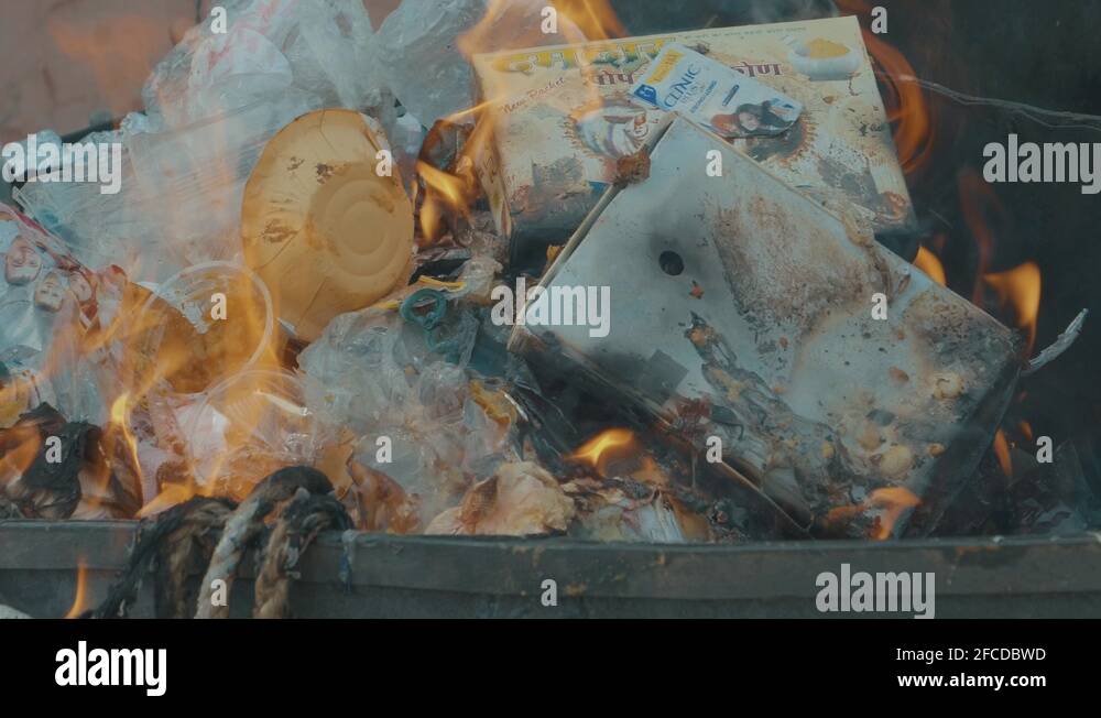 Trash Can On The Street Of India Flaming Releasing Dangerous Pollution ...
