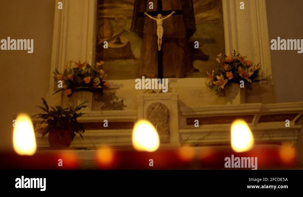 Jesus Christ Statue Church Interior With Candles Burning Stock Video ...