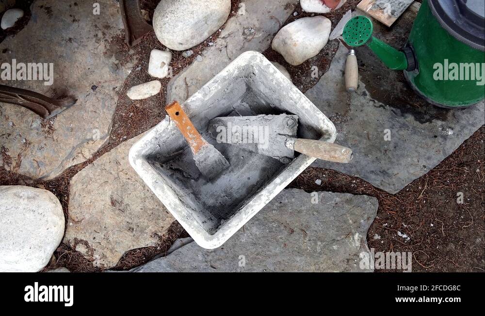 Zoom to dirty box with spatulas in it Stock Video Footage - Alamy