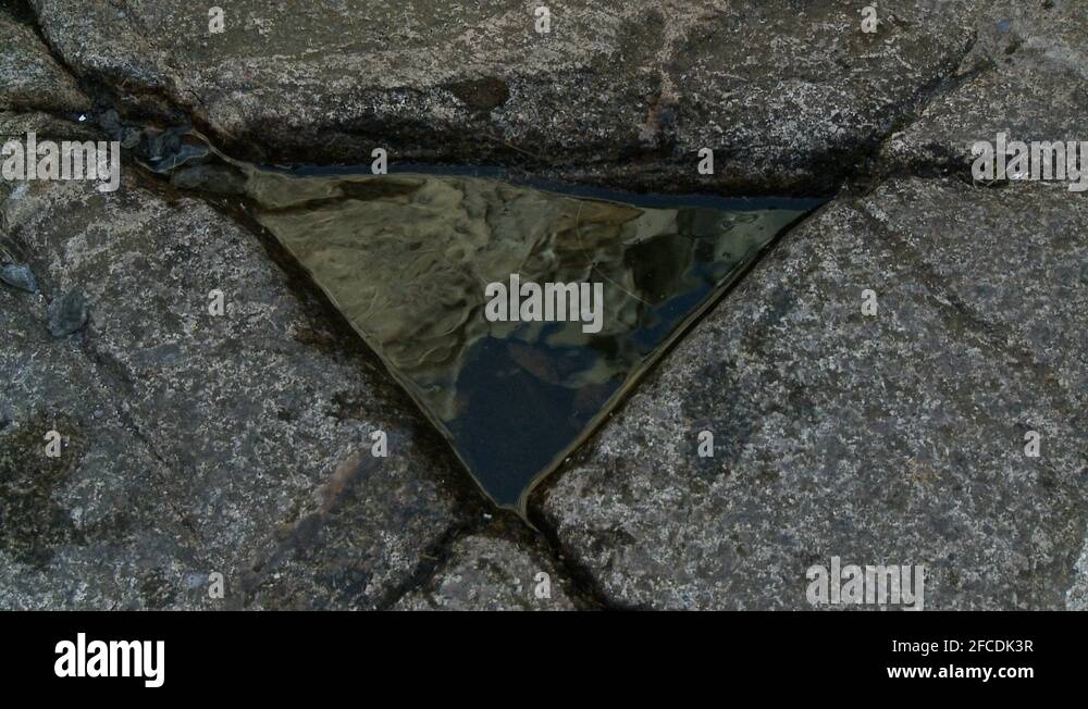 Puddle in rock Stock Videos & Footage - HD and 4K Video Clips - Alamy