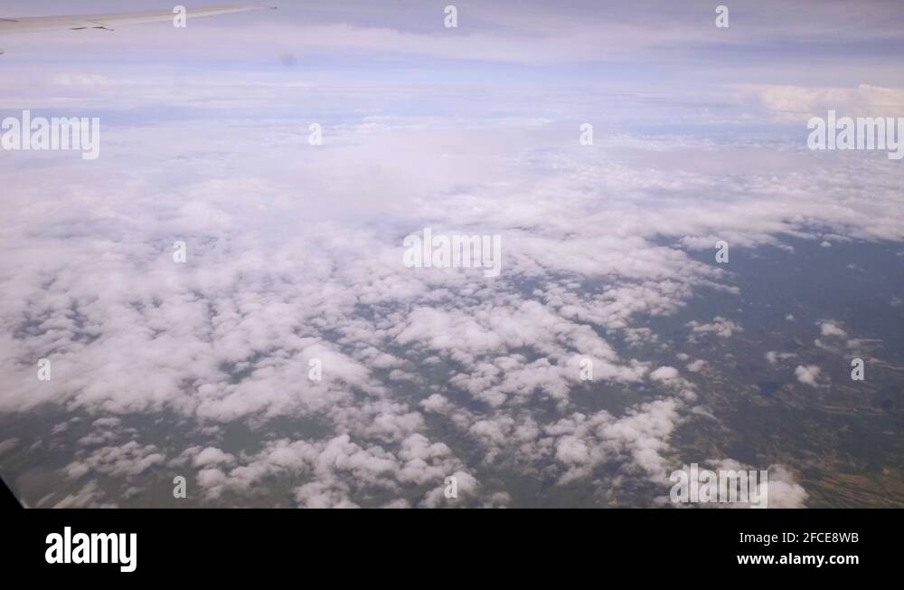 A view of the upper plane window while floating in the air, overlooking ...