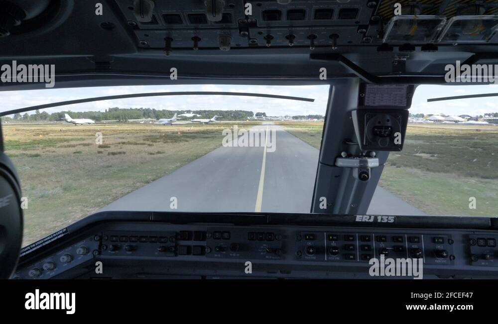Embraer ERJ-135 Airplane taxiing at Le Mans Arnage Airport, cockpit ...