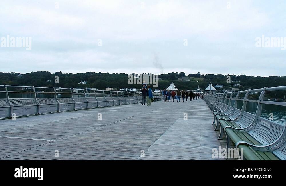 Tourists visiting British seaside Victorian Promenade in North Wales ...