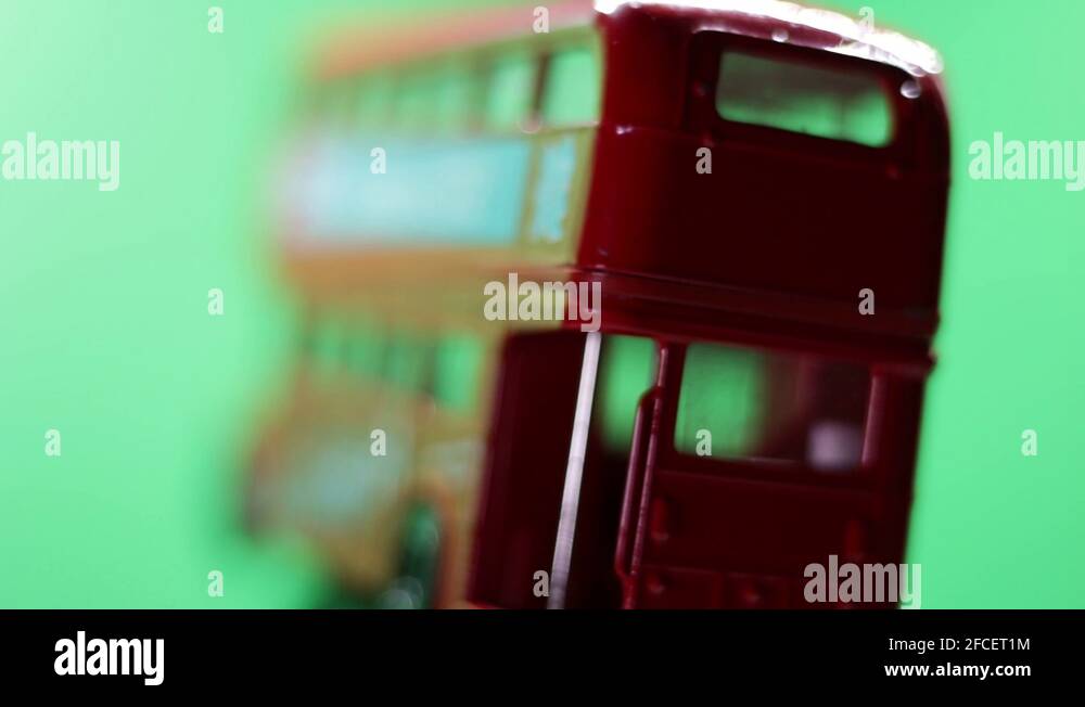 Double Decker Red Bus Turning Around Its Axis On A Green Screen ...