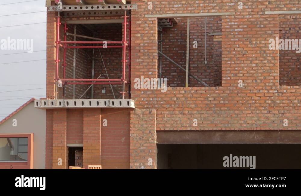 Tilt of new house Construction site outside with scaffolding Stock ...