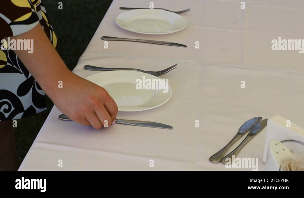 Waiter's hand reveals cutlery by country wedding buffet Stock Video ...