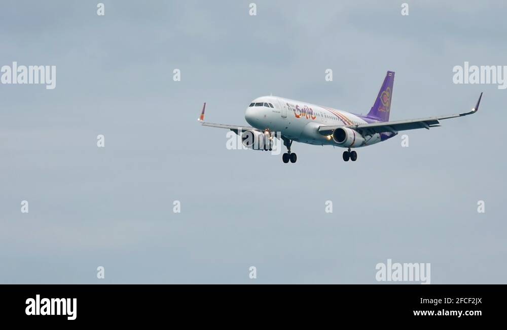 Airbus A320 dropping by landing in the rain Stock Video Footage - Alamy