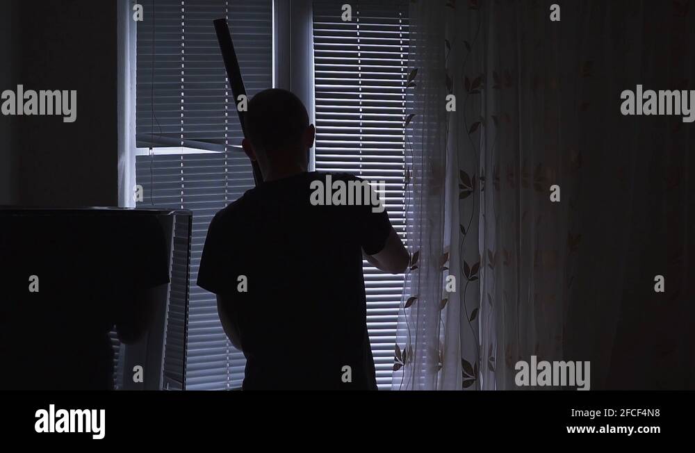 Man intruder window Stock Videos & Footage - HD and 4K Video Clips - Alamy