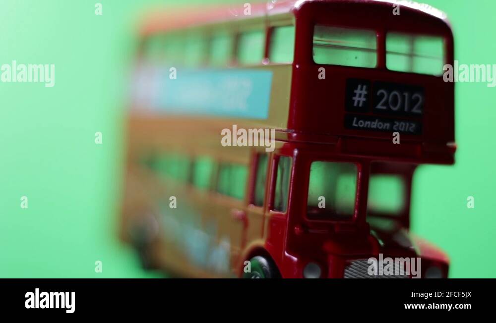 Double Decker Red Bus Turning Around Its Axis On A Green Screen ...