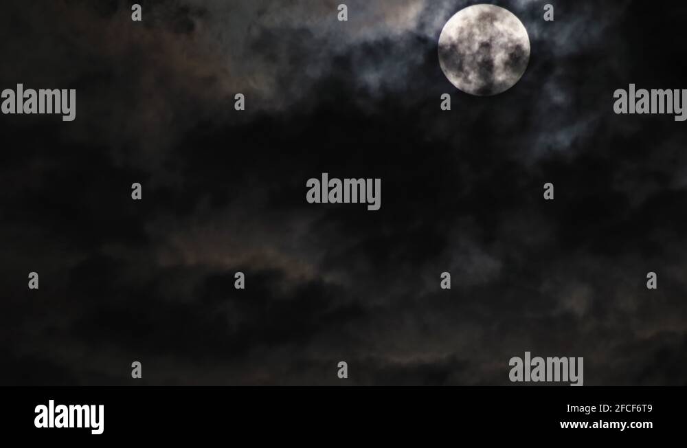 Mysterious night sky with full moon dramatic clouds in the moonlight from full Stock Video ...