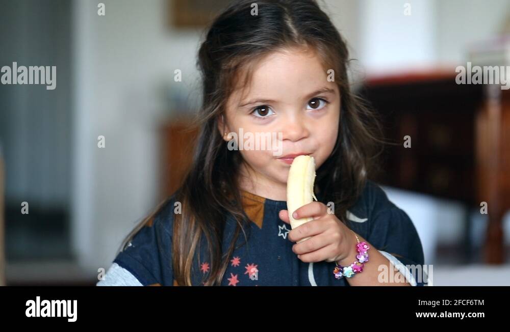 Little girl eating banana Stock Videos & Footage - HD and 4K Video ...