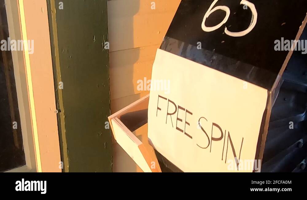 A home made spinning game wheel with numbers on it being spun around ...