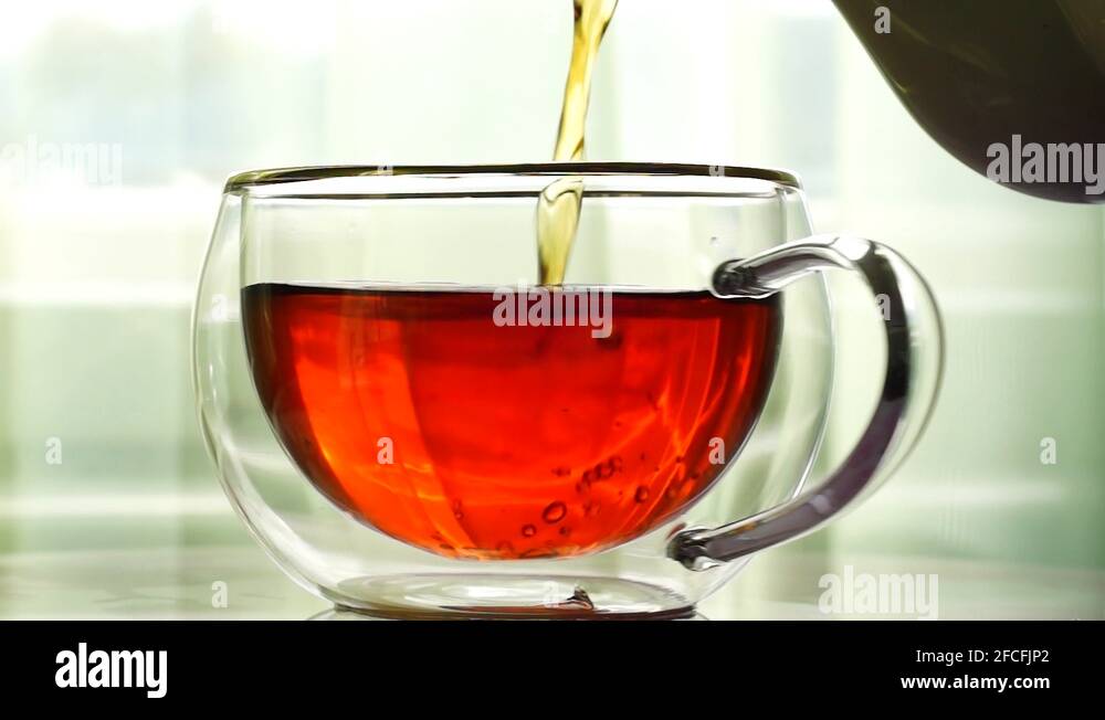Strong black tea Stock Videos & Footage - HD and 4K Video Clips - Alamy