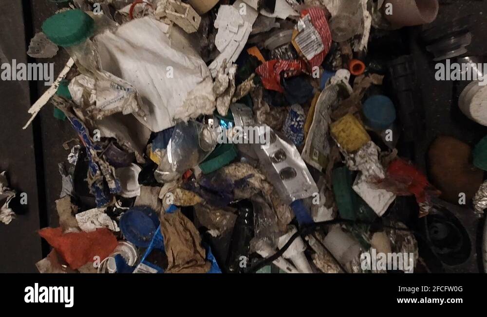 Conveyor belt filled with garbage at rubbish recycling factory. Sorting Stock Video Footage - Alamy