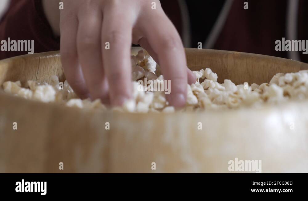 Popcorn eating Stock Videos & Footage - HD and 4K Video Clips - Alamy