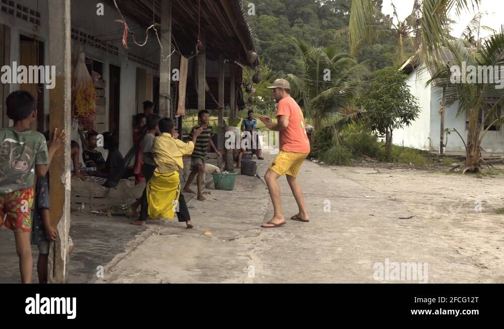 Kids enjoying while friendly fight with a stranger. Happiness is in the ...