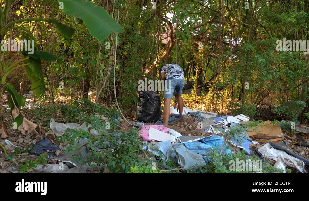 People picking up garbage in park Stock Videos & Footage - HD and 4K ...