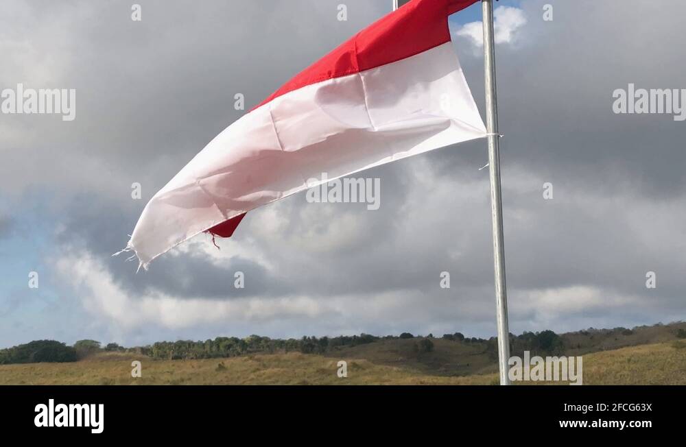 Indonesian Flag blow in the wind. Nusa Penida, Bali. Indonesia flag ...