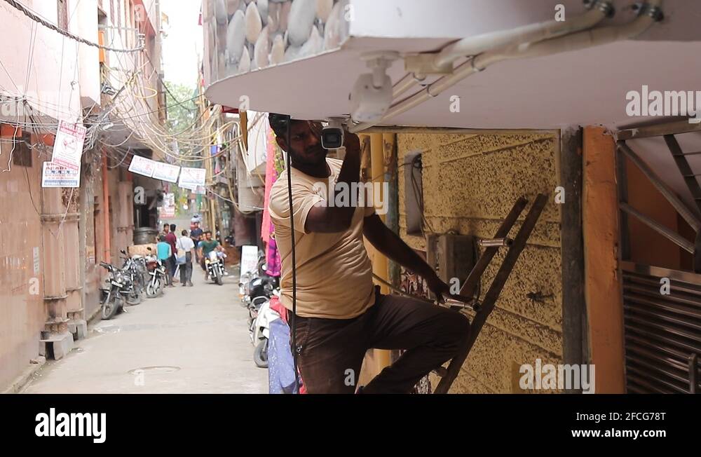 CCTV Camera being installed in neighbourhoods of New Delhi, India Stock ...
