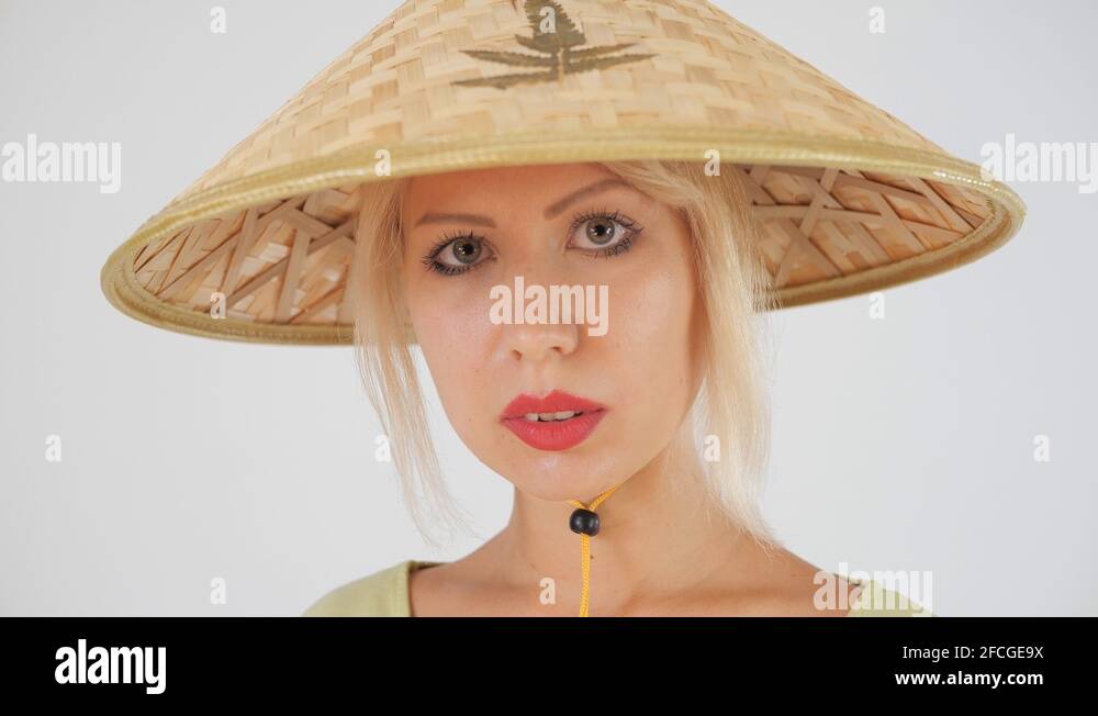 Straw conical hat Stock Videos & Footage - HD and 4K Video Clips - Alamy