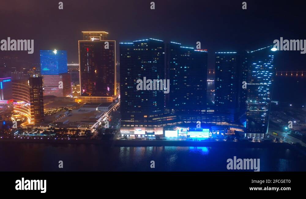 night macau city famous downtown hotel bay aerial panorama 4k china ...