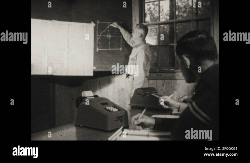 1950s: teacher in front of forestry class, men digging in soil, man ...