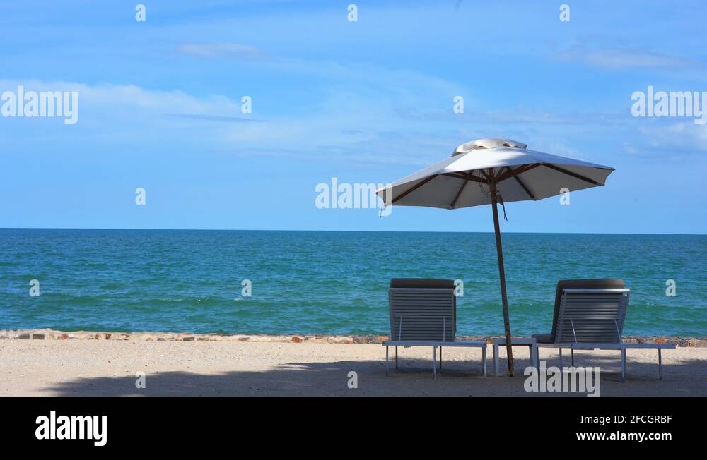 Sun parasol beach Stock Videos & Footage - HD and 4K Video Clips - Alamy
