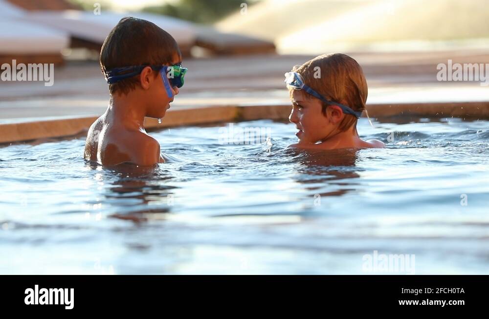 Kids at the swimming pool during summer holiday vacations Stock Video ...