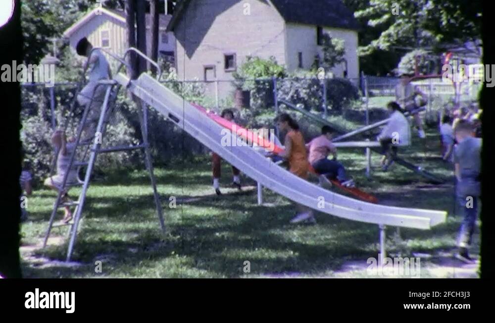 1960s KIDS at Play on Slide PLAYGROUND FUN Children Vintage Old Film ...