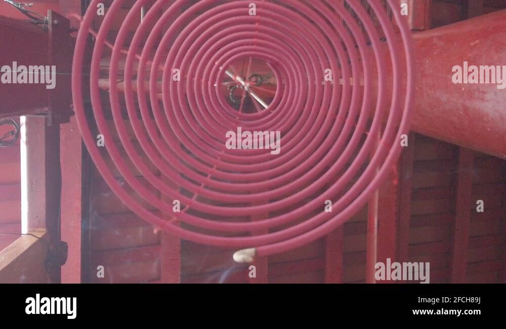 video from below of an incense coil burning in a chinese temple Stock ...