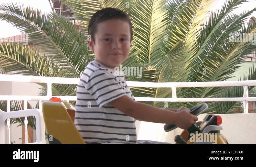 Little Boy driving car Stock Video Footage - Alamy