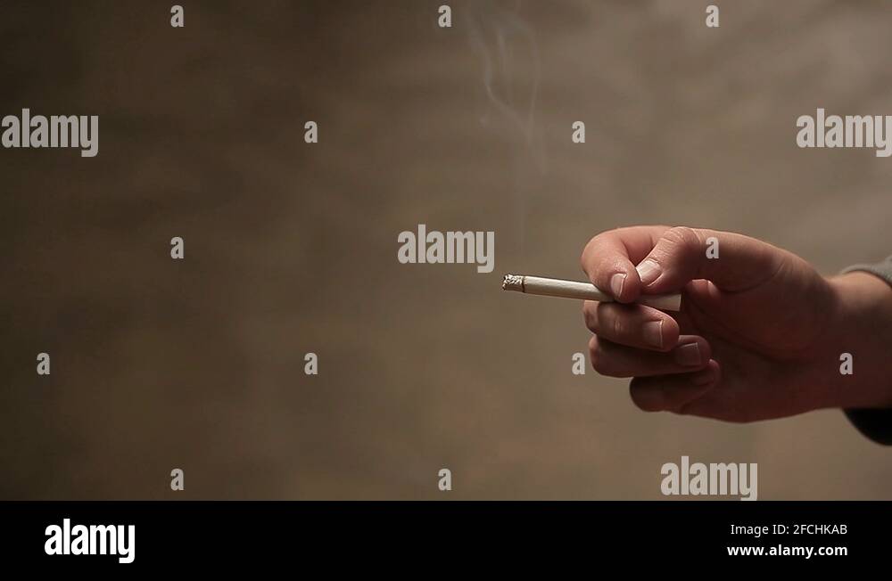 Hand and cigarette Stock Videos & Footage - HD and 4K Video Clips - Alamy