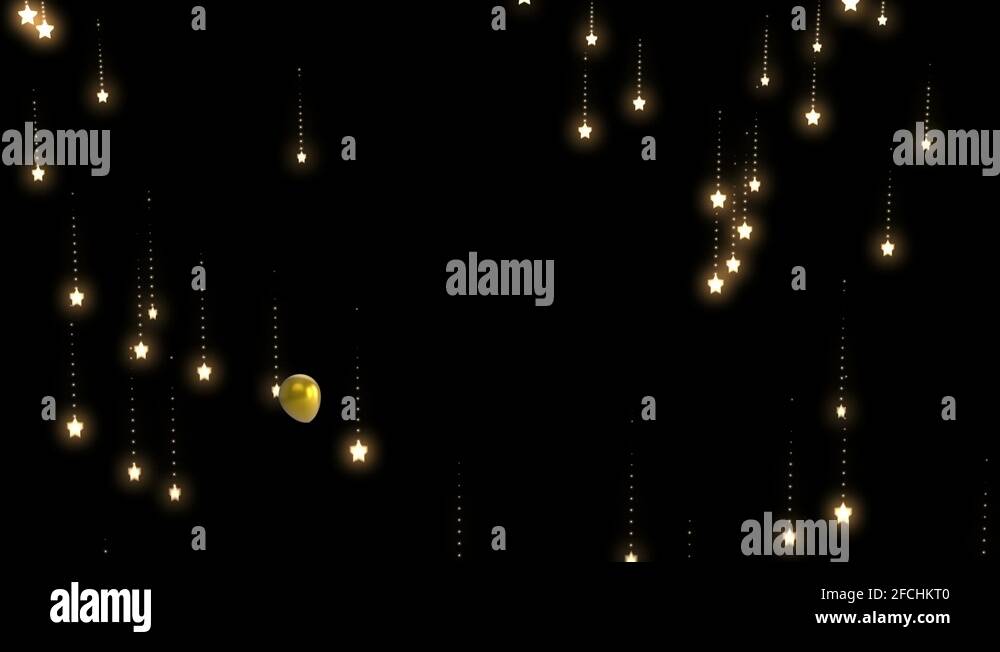 Floating gold balloons and falling stars Stock Video Footage - Alamy