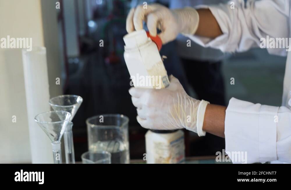 Research measuring scientist learning chemistry Stock Videos & Footage ...