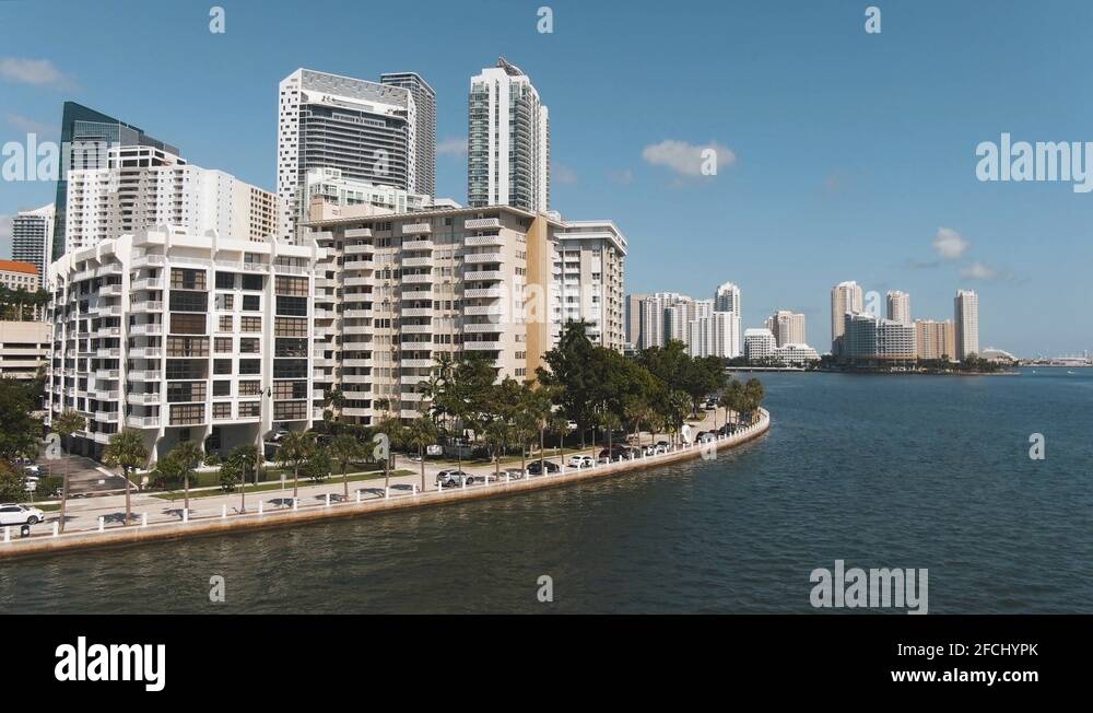 Rising aerial view of Brickell waterfront buildings in downtown Miami ...