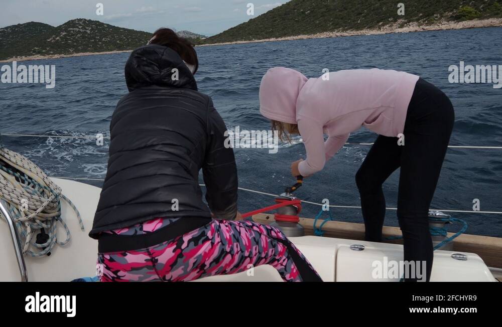 Two girls sailing Stock Videos & Footage - HD and 4K Video Clips - Alamy