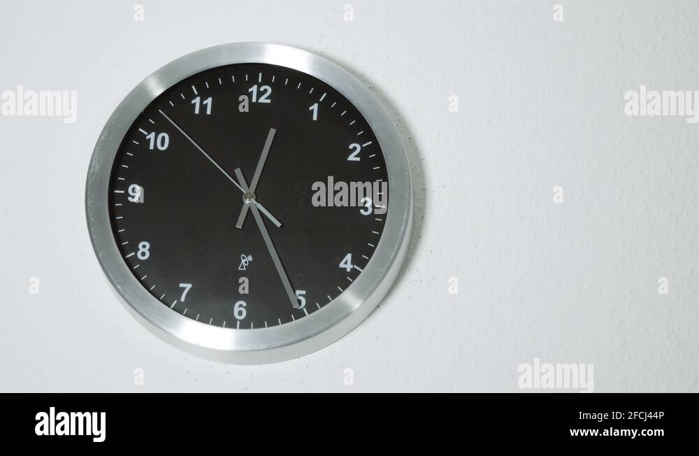 Clock hanging on building Stock Videos & Footage - HD and 4K Video ...