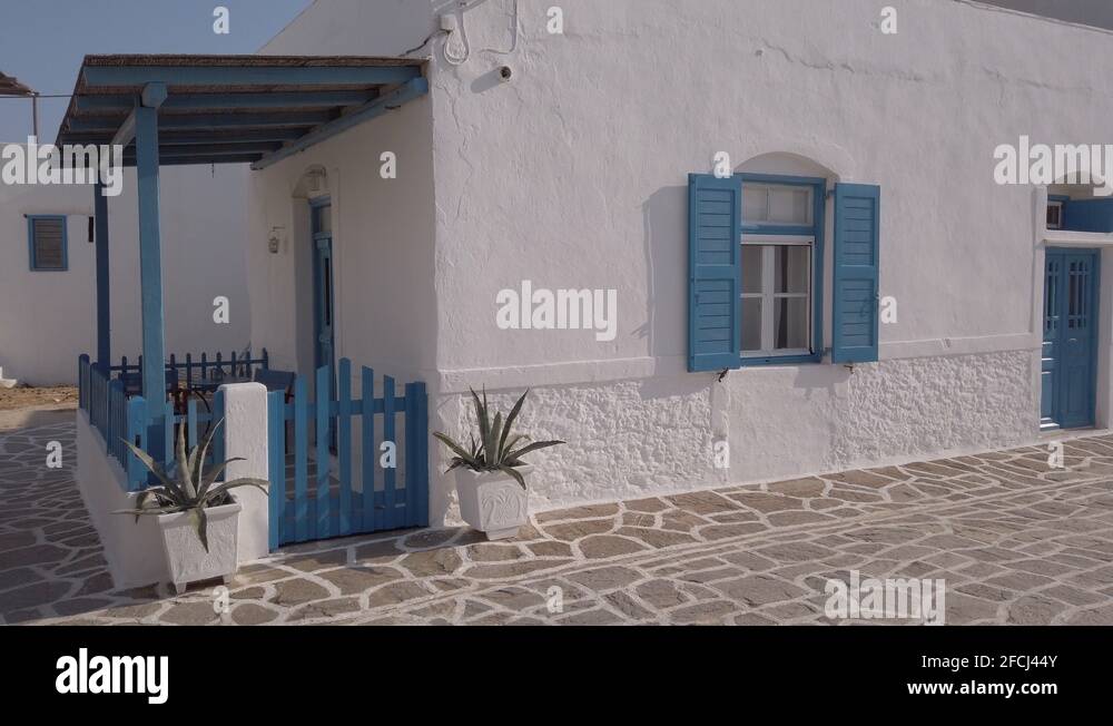 Walking view of Marpissa traditional village houses. Greek island Paros ...