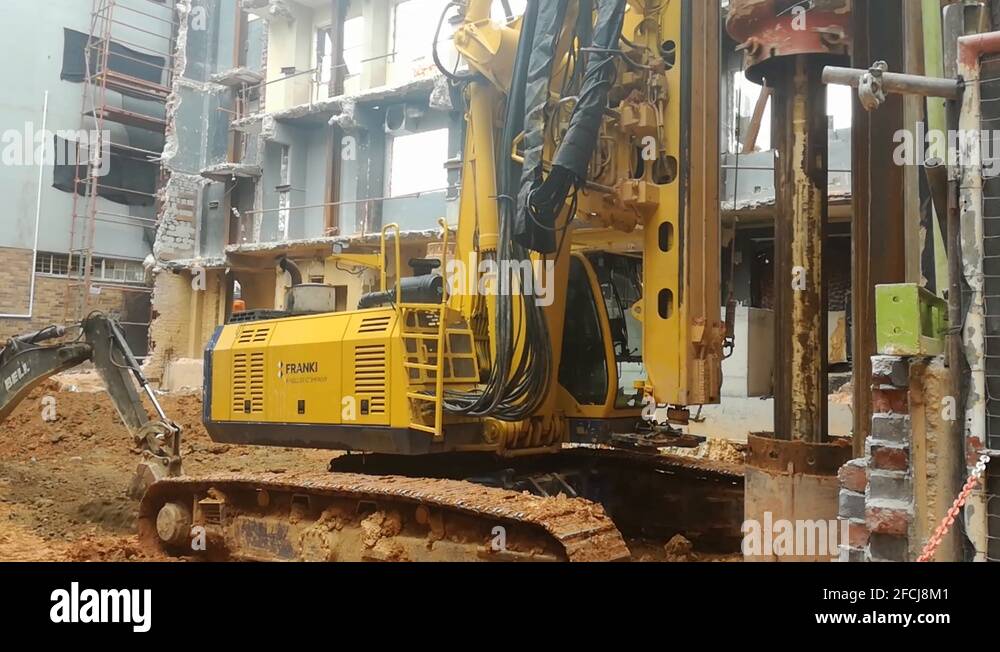 Construction excavator digger foundations Stock Videos & Footage - HD ...