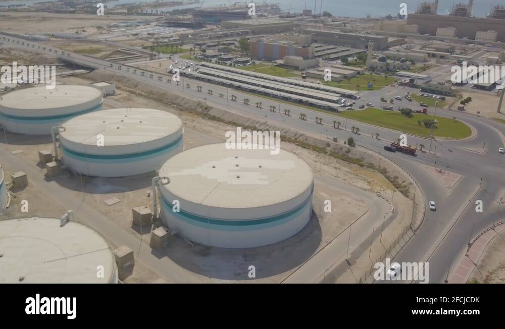 Very large storage tank silos with pipes (4K Stock Video Footage - Alamy