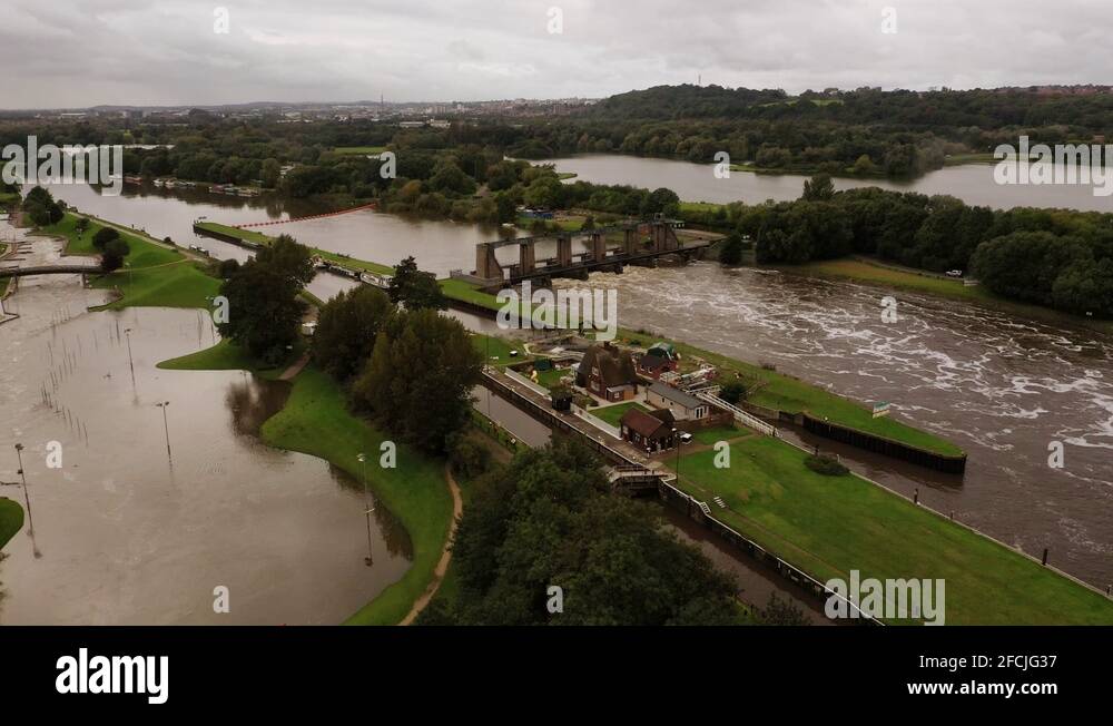 Aerial wide shot Colwick Sluice flood gates and water reservoir scenic ...