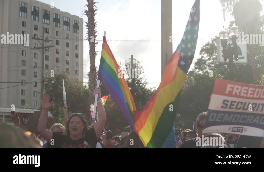 People Marching in Street With Pride Flags at River City Pride Parade ...