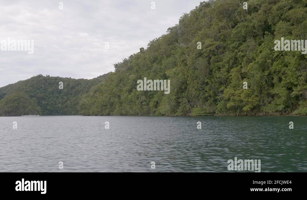 Tropical landscape rainforest hills and azure water in lagoon with ...