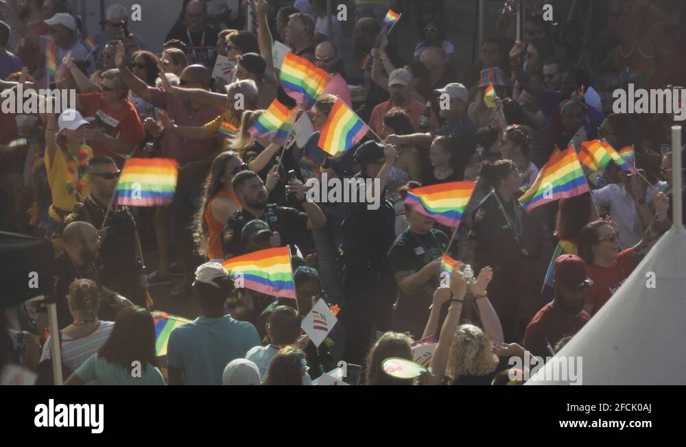 Police Officers Marching With Pride Flags at River City Pride Parade in ...