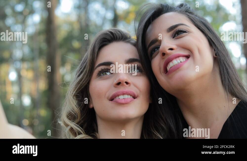 Lgbt Lesbian Couple Kissing Each Other While Taking A Selfie Stock Video Footage Alamy