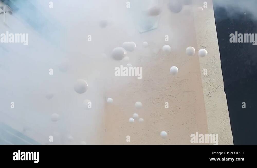 Smoke bubbles floating in mid air to create a special effect look for a ...