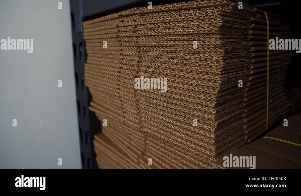 Close zoom in on big stack of flat cardboard boxes Stock Video Footage ...