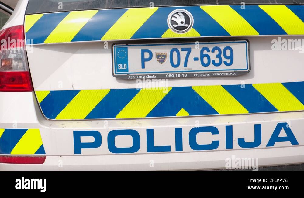 Police sign with emergency dial number on the side of patrol car Stock ...
