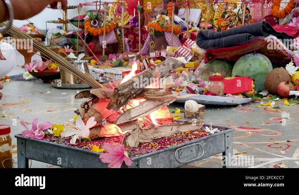 yajna, a ritual done in hindu worship where wood is set on fire with ...